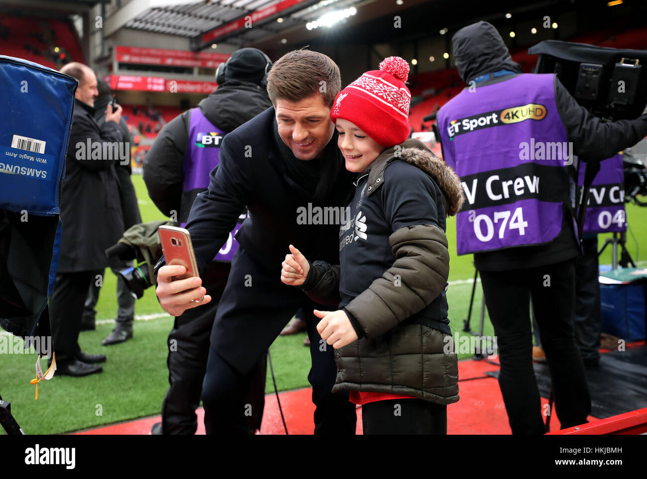 Steven Gerrard poses for a selfie with a fan before the Emirates FA Cup ...