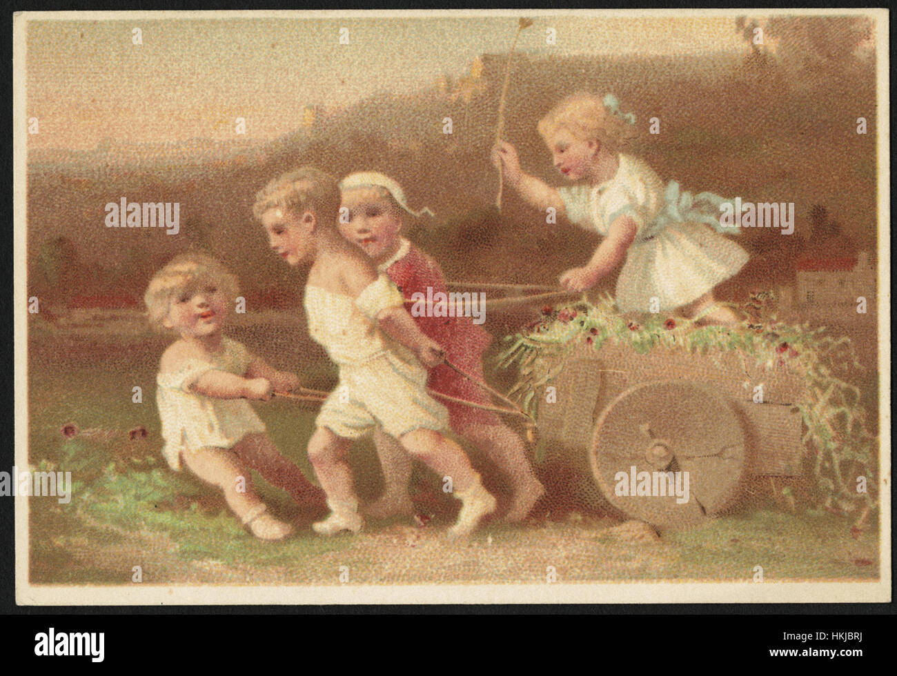 Four children - three pulling a cart, one riding in it Stock Photo - Alamy