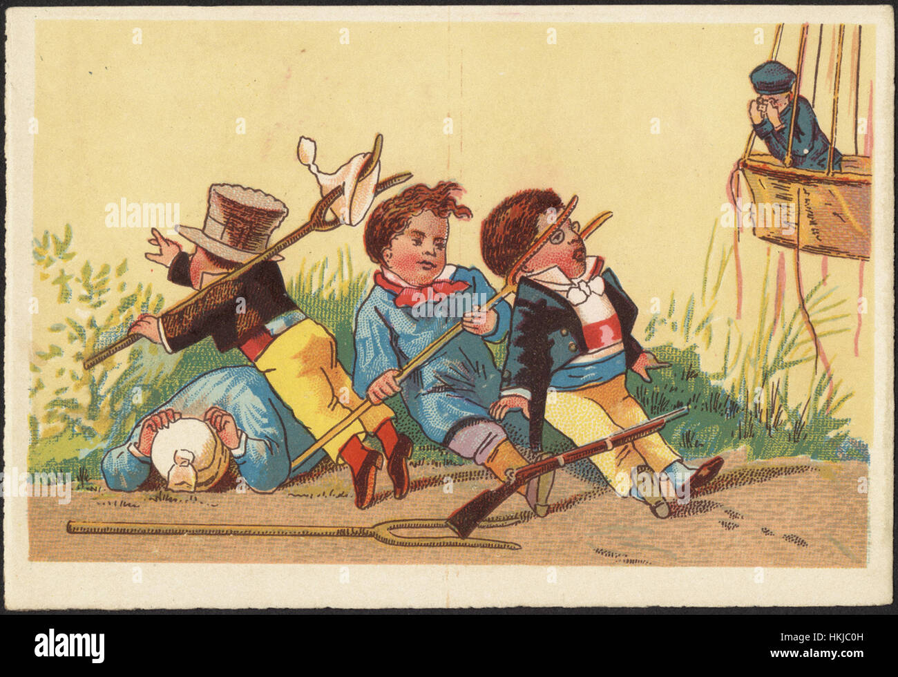 Four boys falling over while the hot air balloons leaves the ground ...