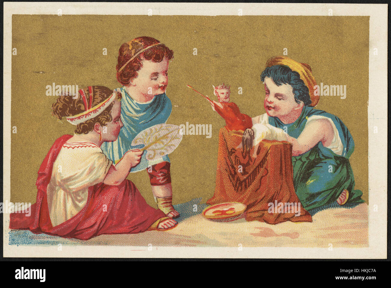 Girl and boy watching another boy performing a puppet show, all wearing ...