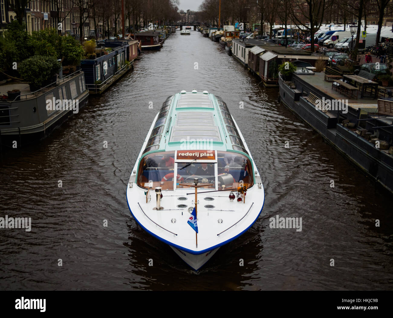 Tourist boat on the channel of Amsterdam, the Netherlands Stock Photo ...