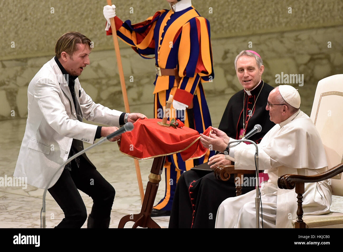 Pope Francis looks at a performance of a member of the Golden Circus in ...