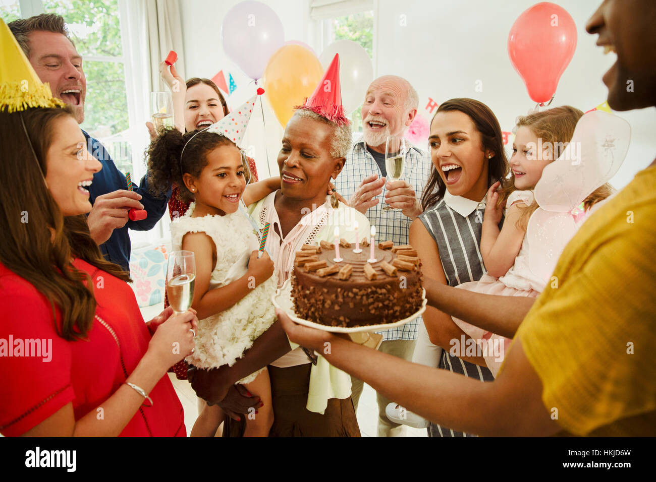 Woman presenting birthday cake hi-res stock photography and images - Alamy