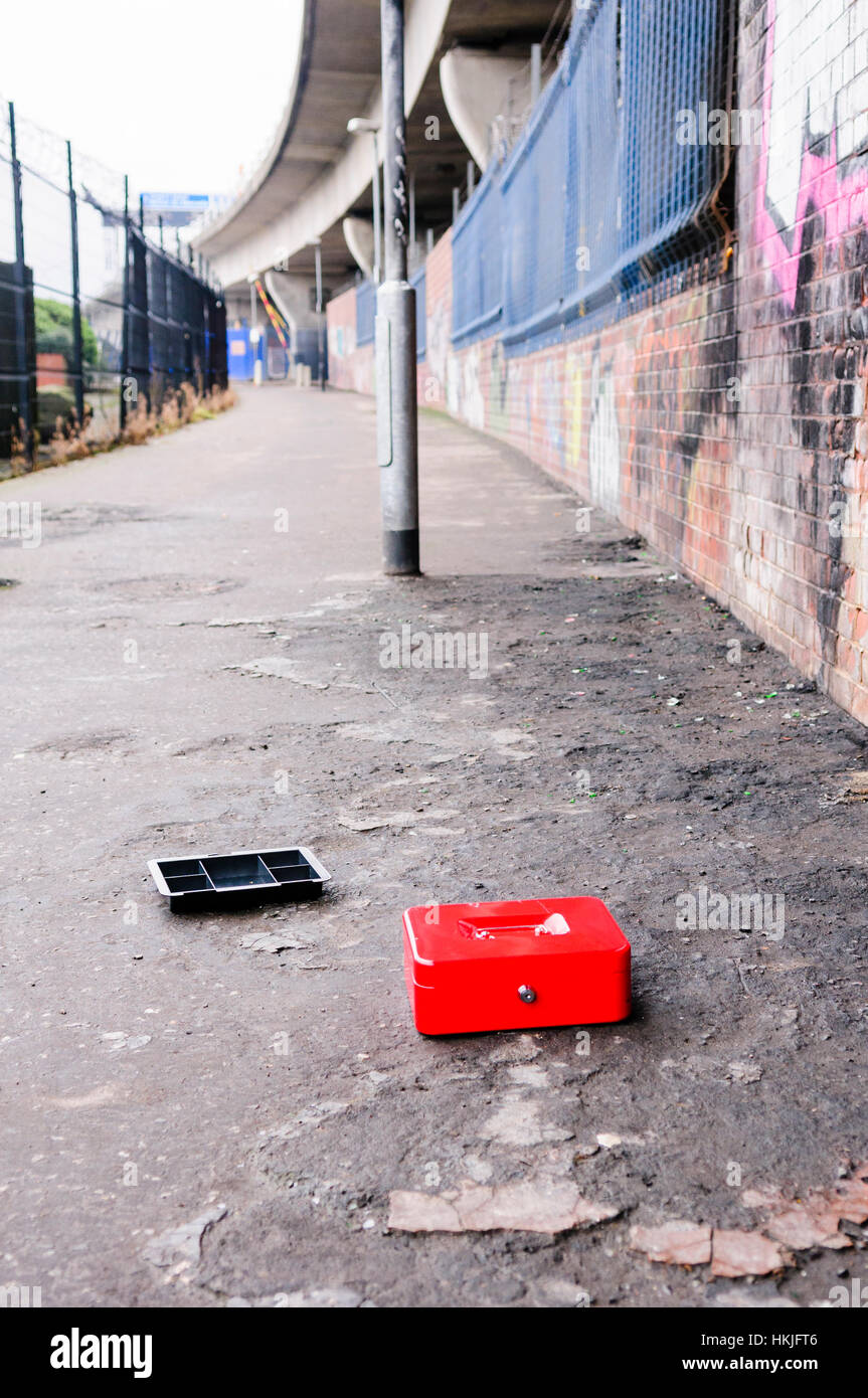 Petty Cash box lies empty on a path after being stolen from an office ...