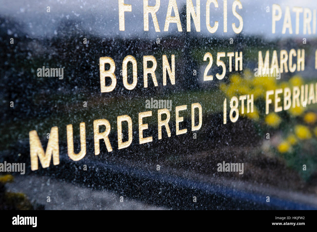 Inscription on a gravestone indicating the deceased was murdered Stock ...