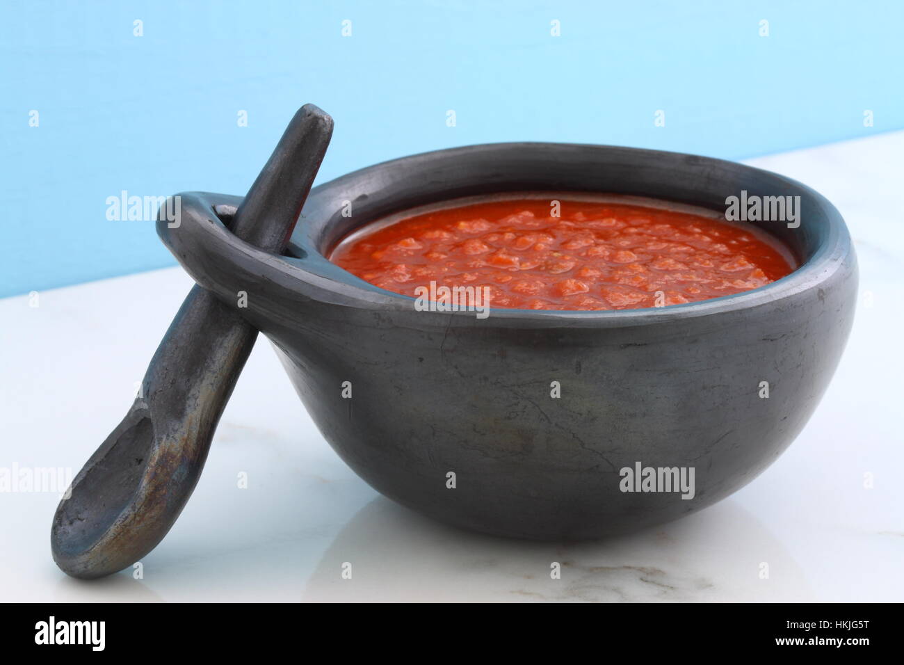 Artisan mexican red hot sauce on retro vintage carrara marble in ...