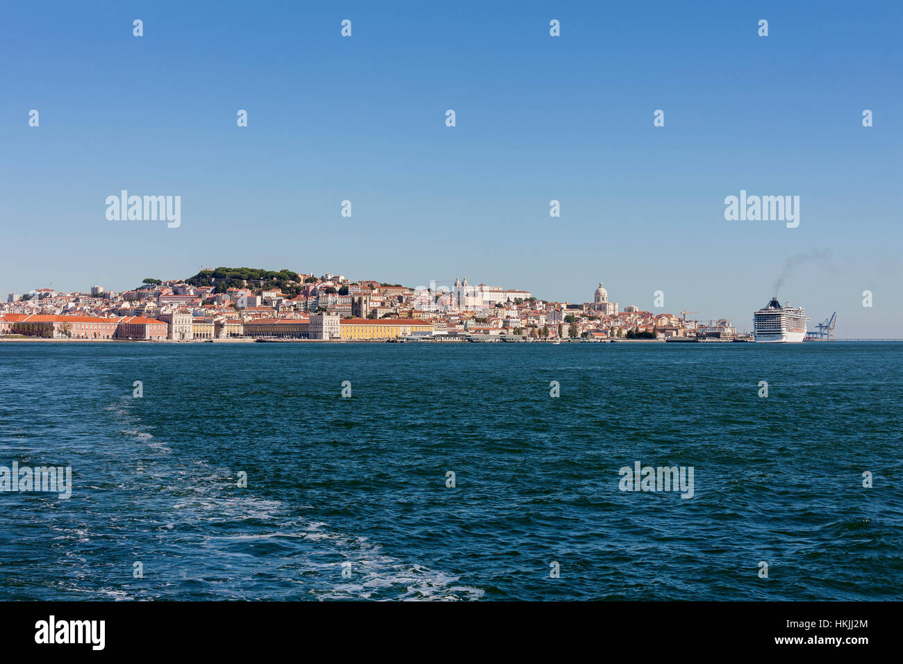 Distant view of city at waterfront, Lisbon, Portugal Stock Photo - Alamy