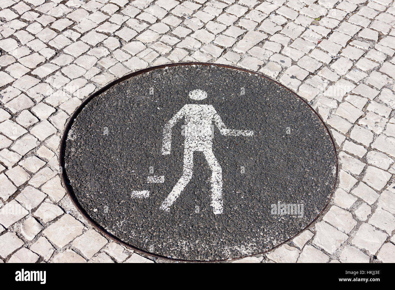 Pedestrian sign on sewage, Lisbon, Portugal Stock Photo - Alamy