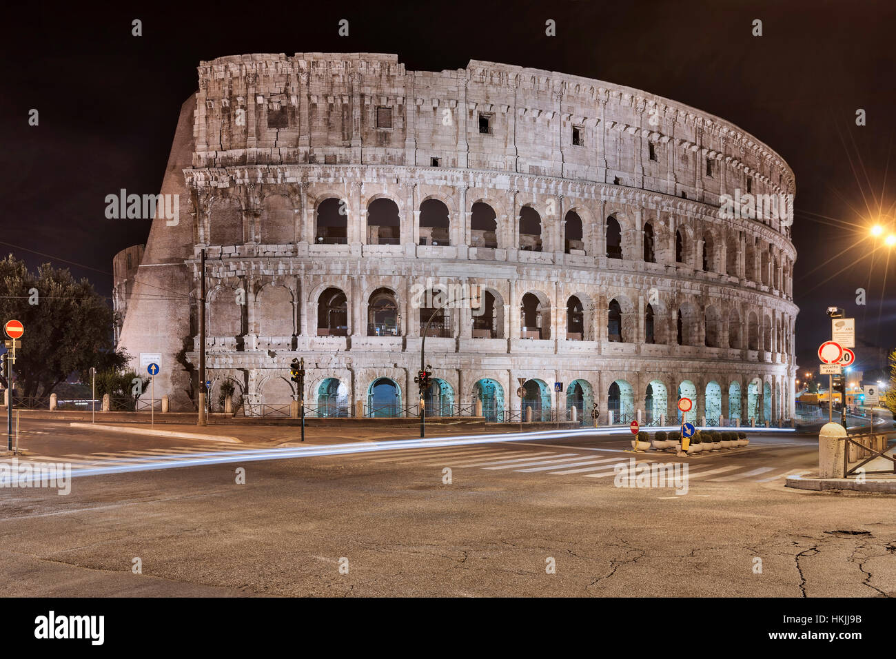 Colosseum lit up at night, Rome, Italy Stock Photo - Alamy