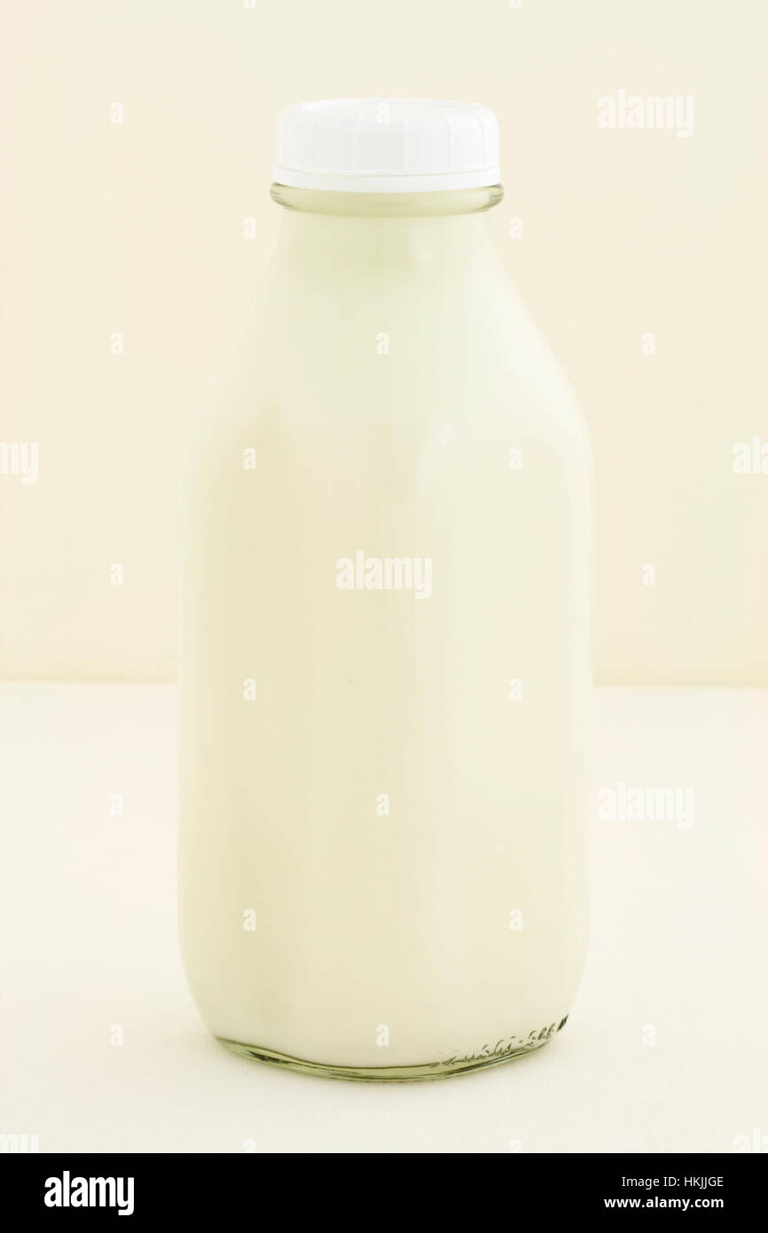 Delicious, nutritious and fresh Quart Milk Bottle Stock Photo - Alamy