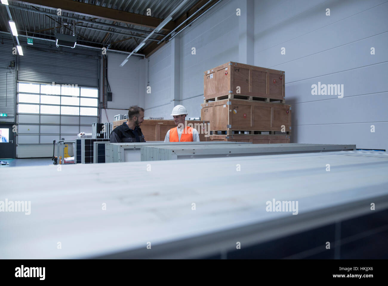 Store workers working in a distribution warehouse, Freiburg im Breisgau ...
