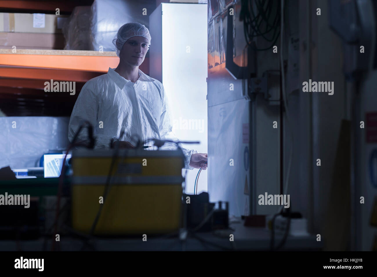 Clean room worker working in warehouse, Freiburg im Breisgau, Baden ...