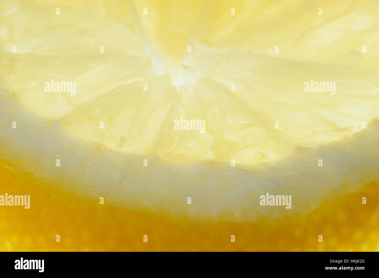 lemon slice macro close up on white background Stock Photo - Alamy