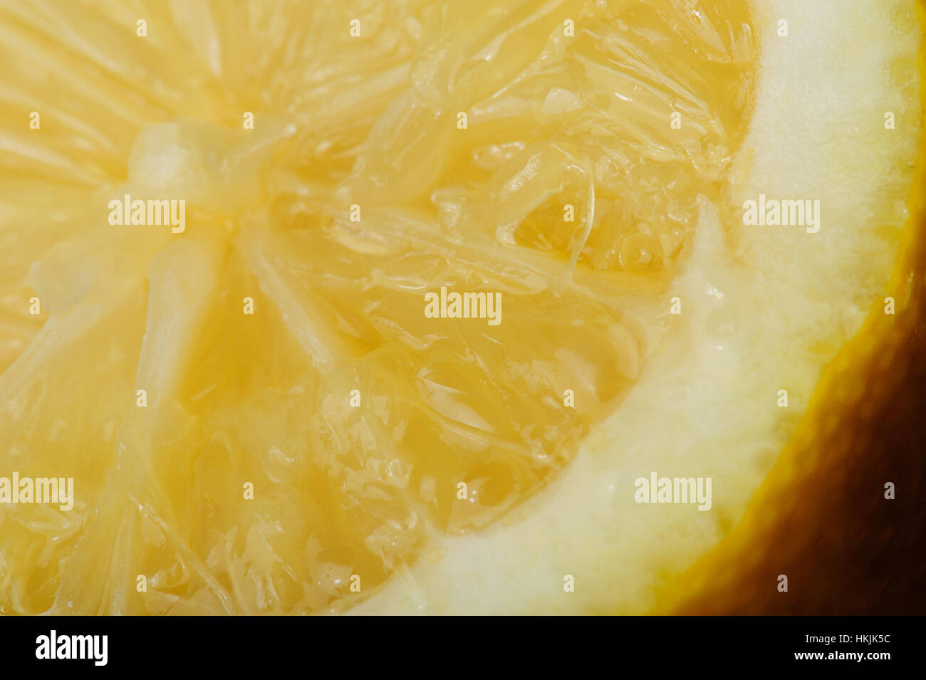 lemon slice macro close up on white background Stock Photo - Alamy