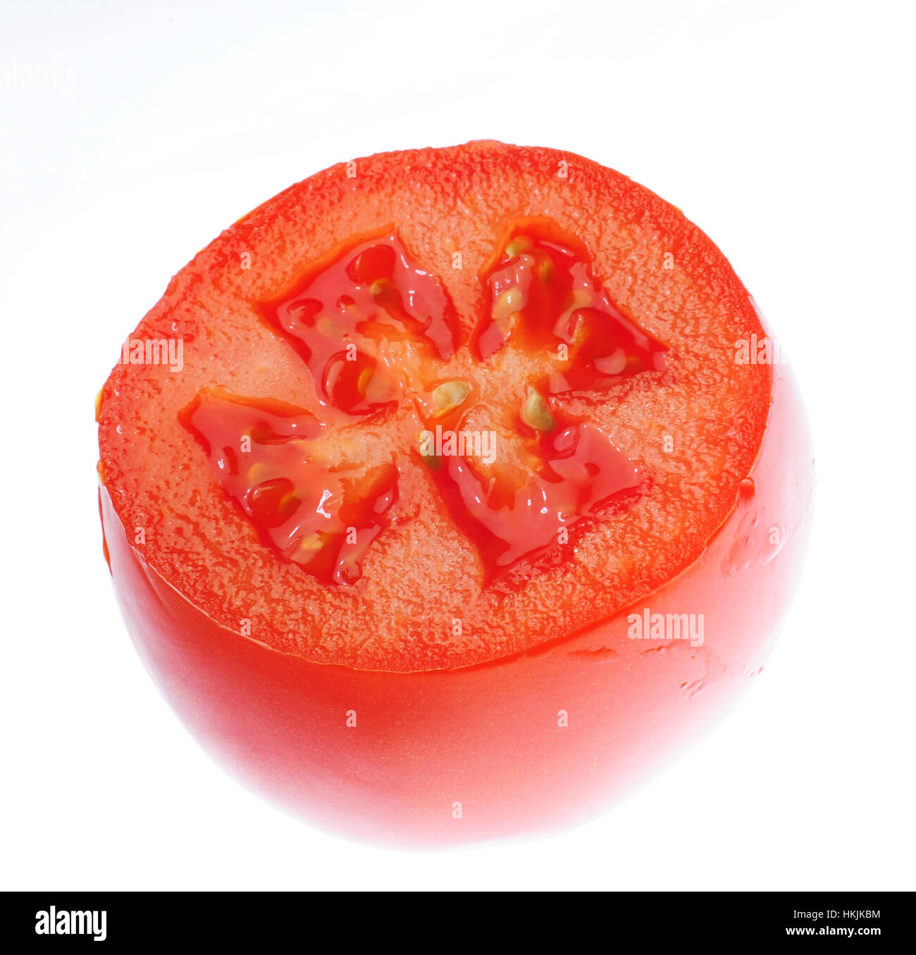 tomato half fresh vivid slice isolated on white Stock Photo - Alamy