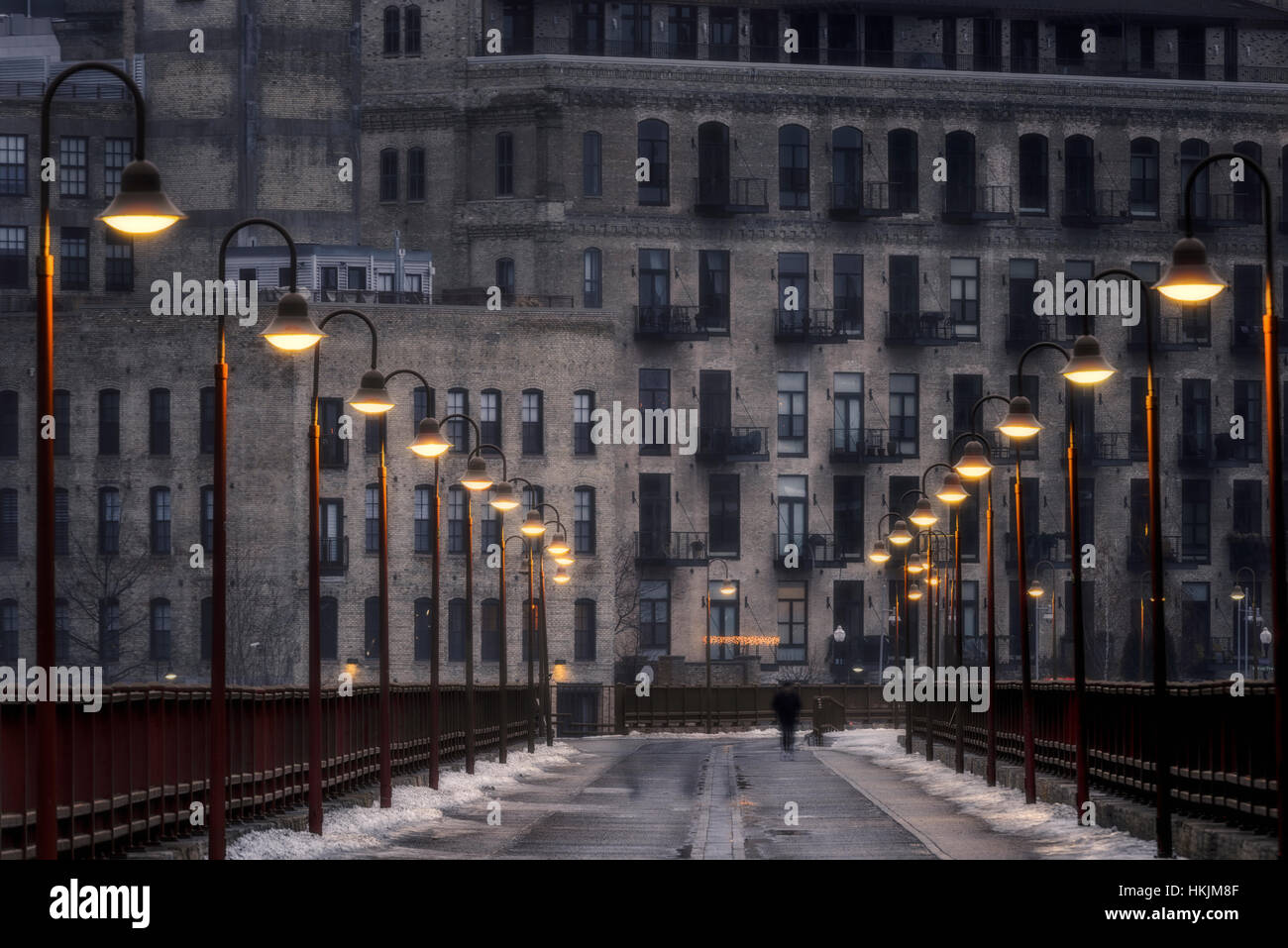 Lighted Stone Arch Bridge walkway in Minneapolis, Minnesota Stock Photo ...
