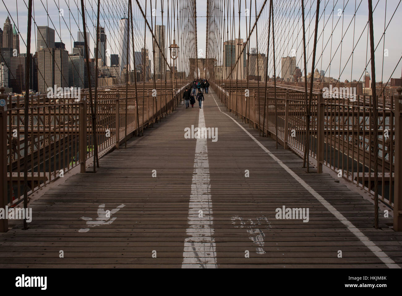 Pedestrian and bicycle path on the Brooklyn Bridge with view on the ...