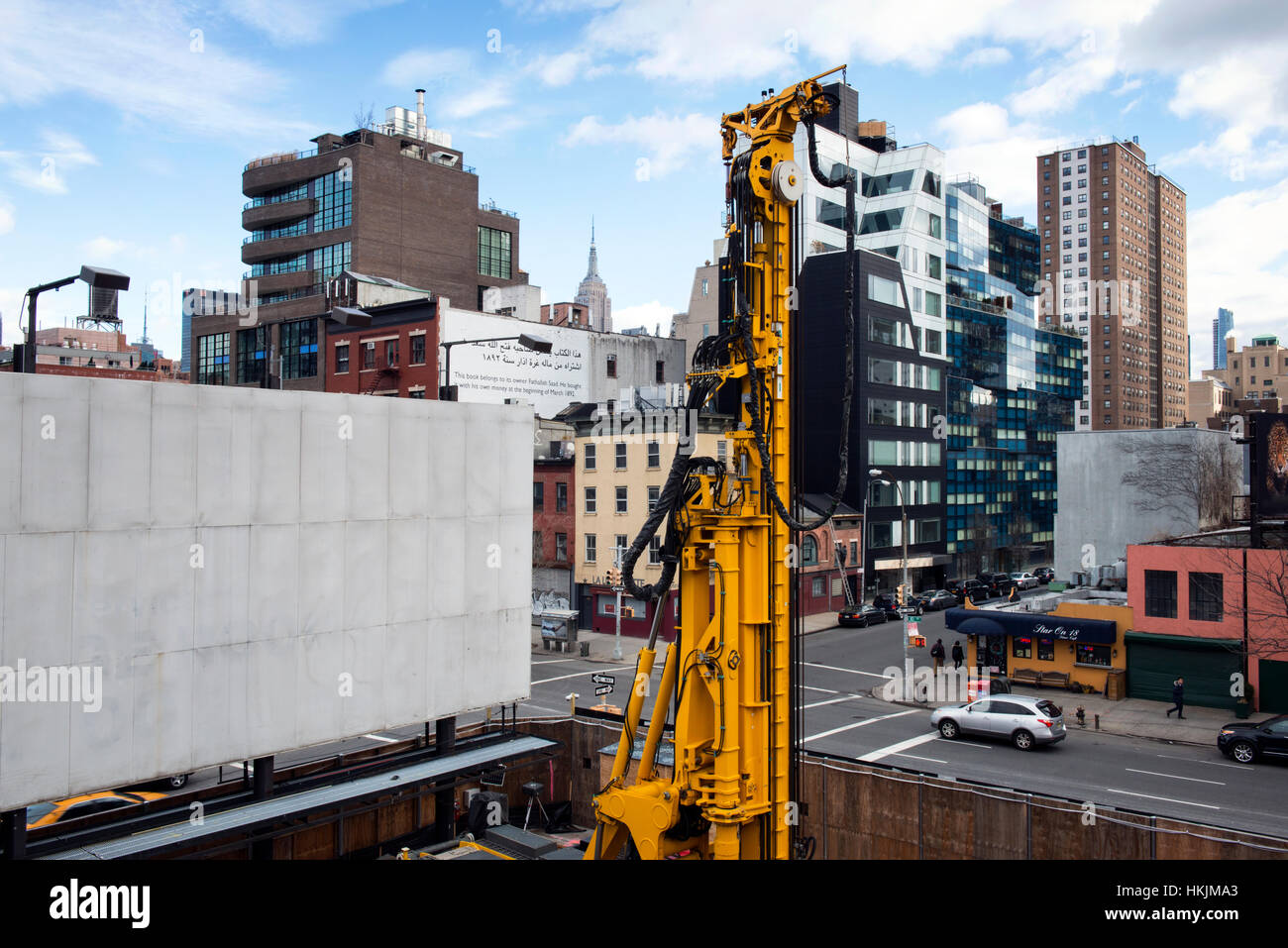 An engineering vehicle on a construction site at the High Line in front ...