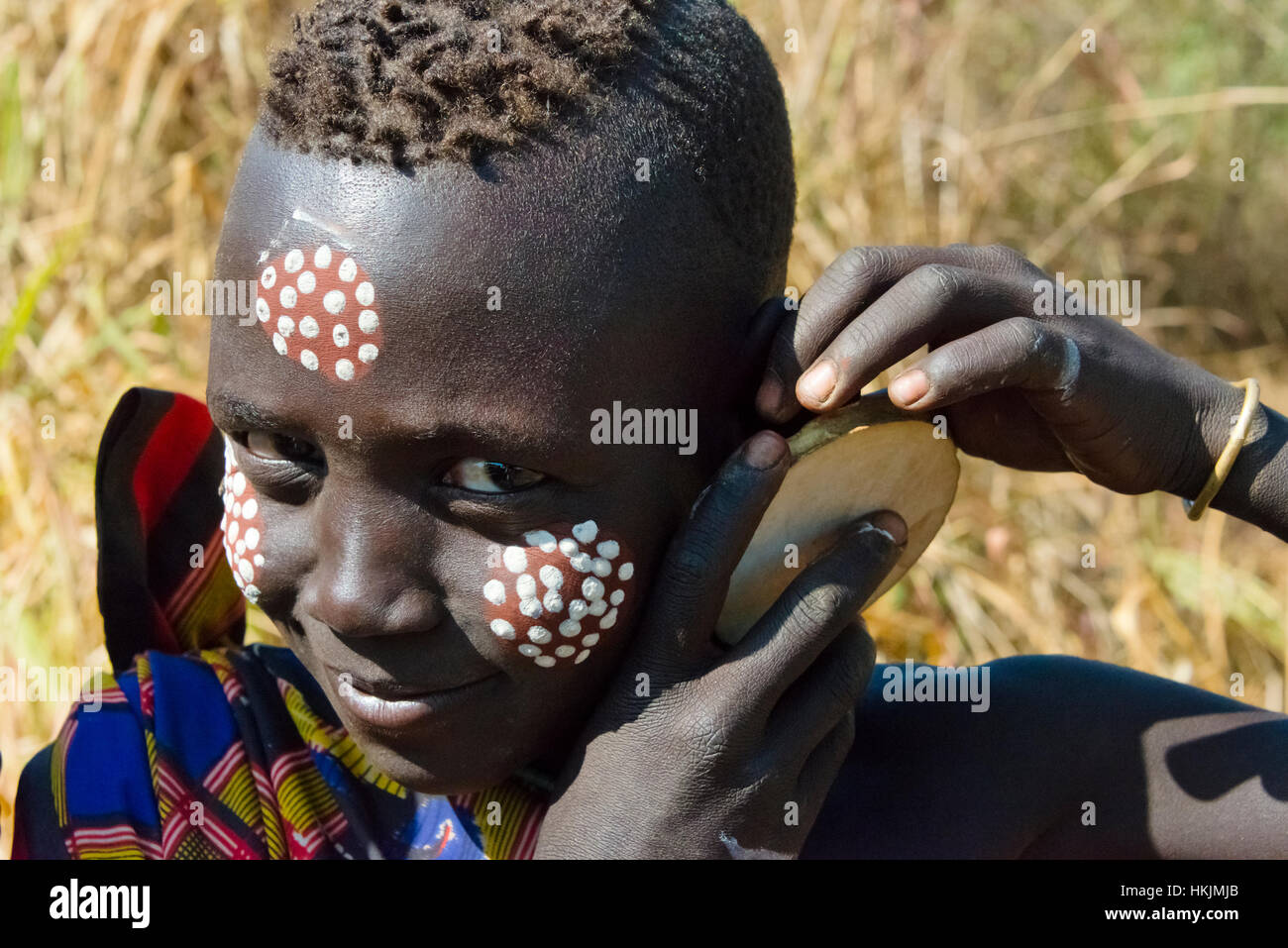 Mursi ear hi-res stock photography and images - Alamy