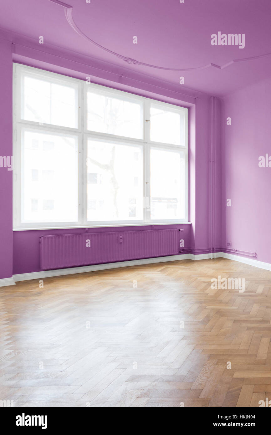 violet walls, pink room wtith wooden floor Stock Photo - Alamy