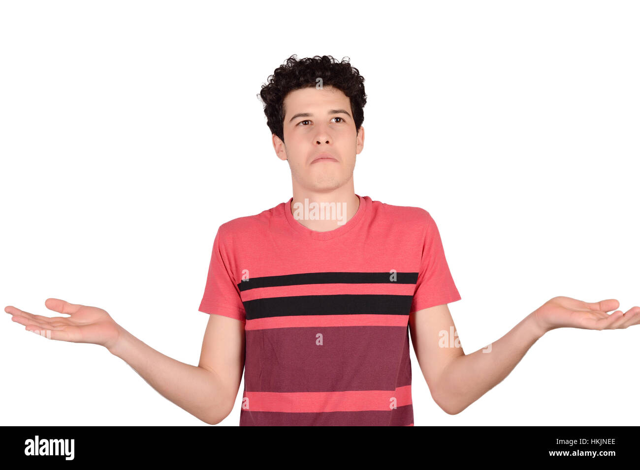 Portrait of a young man who do not understand what is happening ...