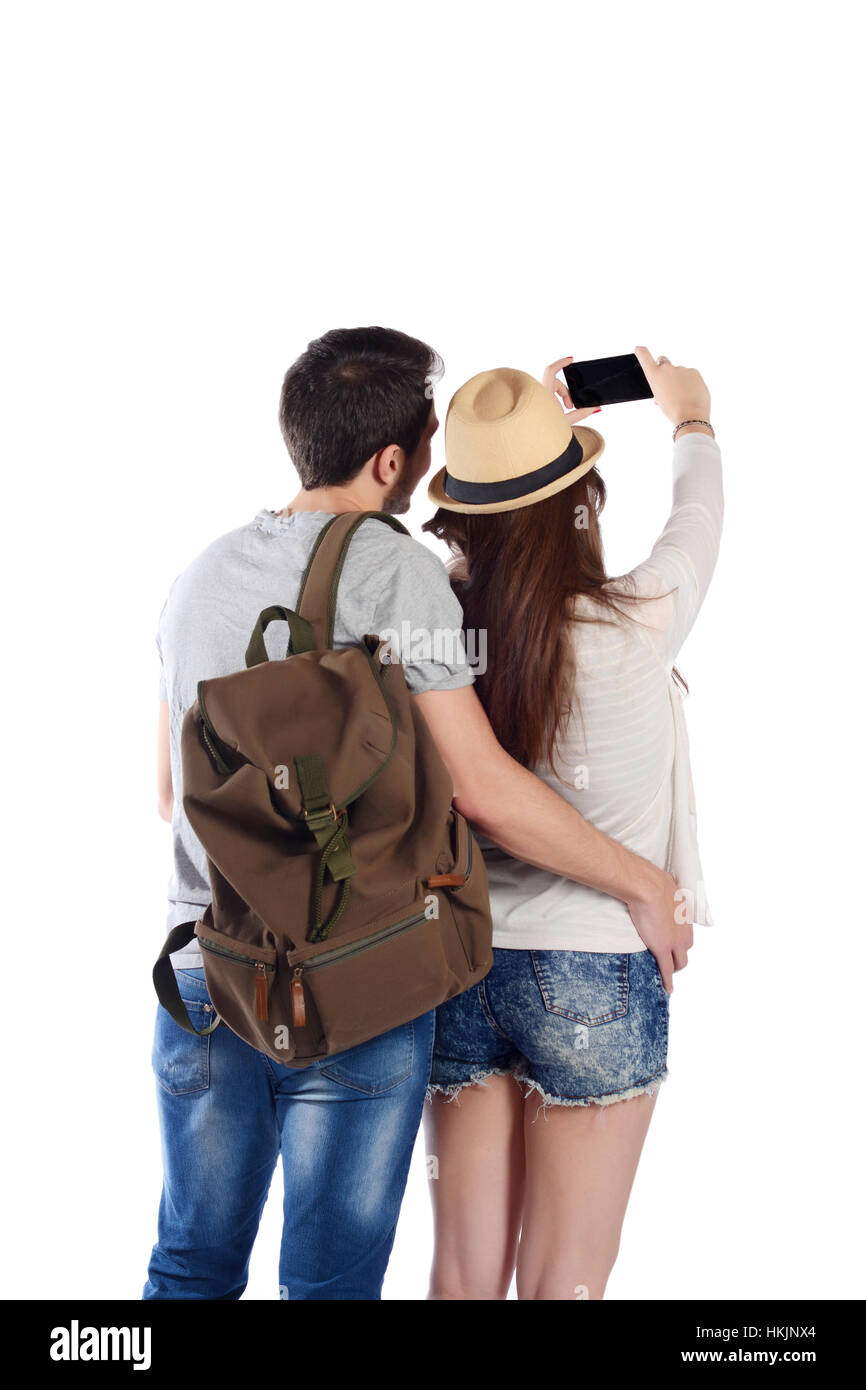 Back view of a traveling young couple and looking up. Travel concept ...