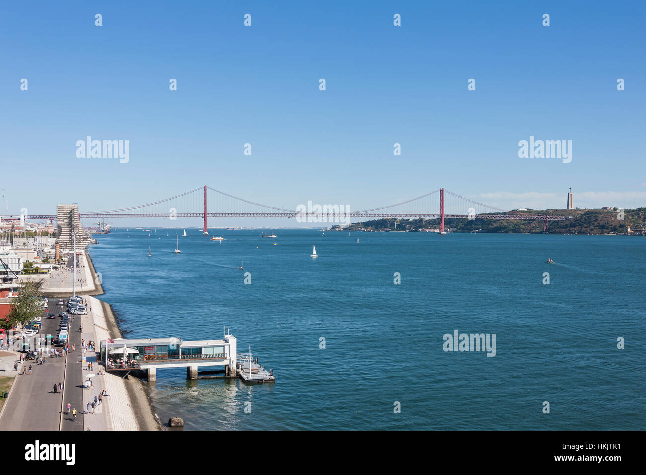 Bridge across river, April 25th Bridge, River Tagus, Lisbon, Portugal ...