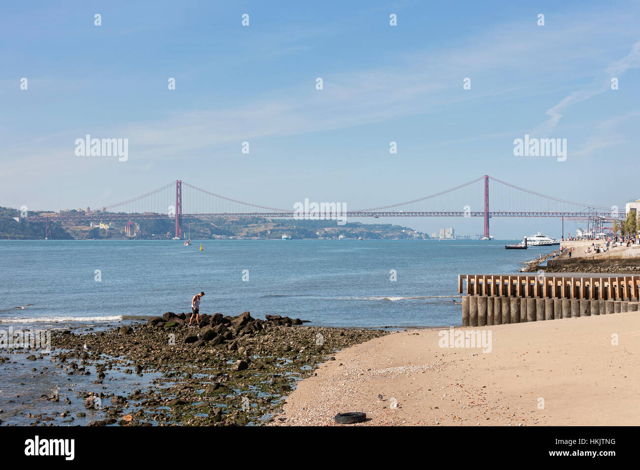 Bridge across river, April 25th Bridge, River Tagus, Lisbon, Portugal ...