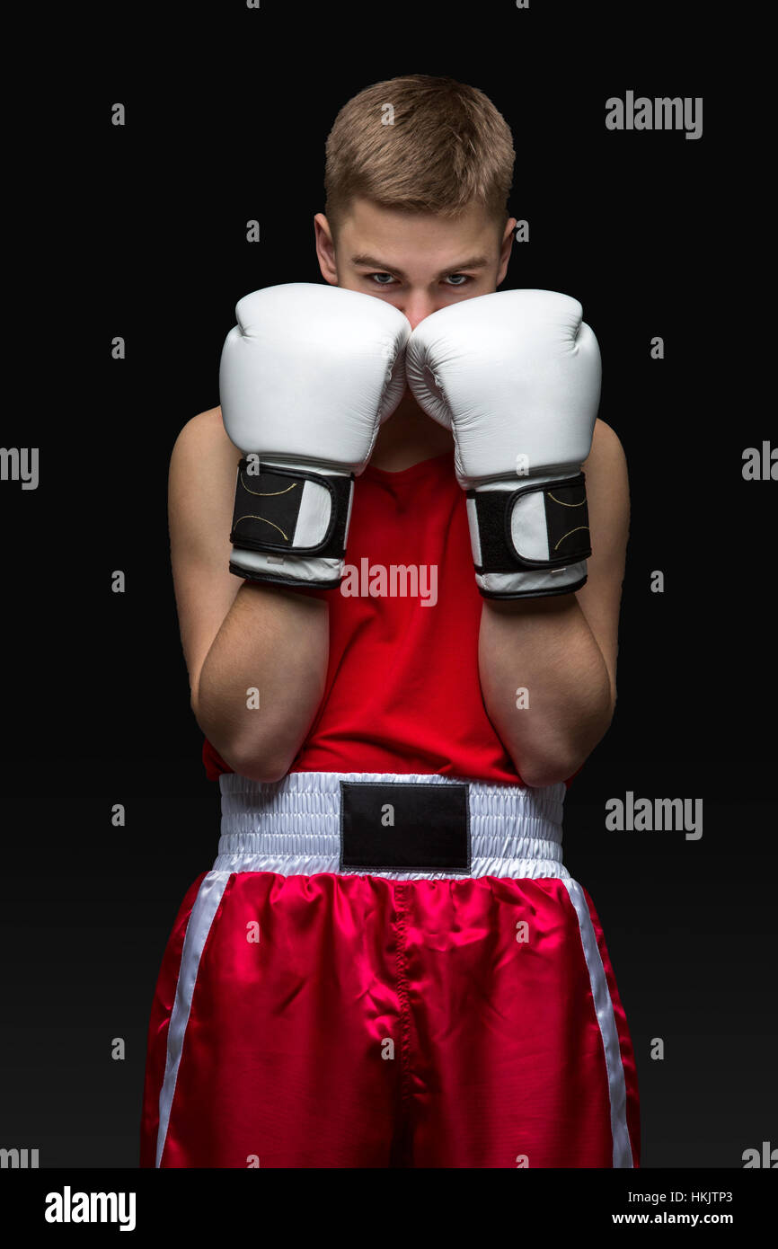 Young boxer sportsman in red sport suit Stock Photo - Alamy