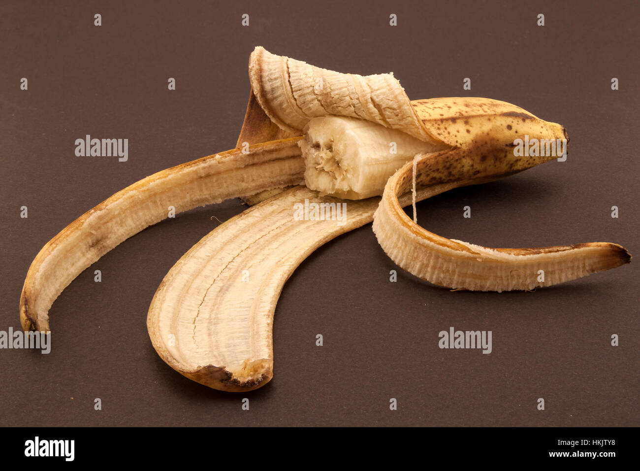 Ripe rotten banana on dark background Stock Photo - Alamy