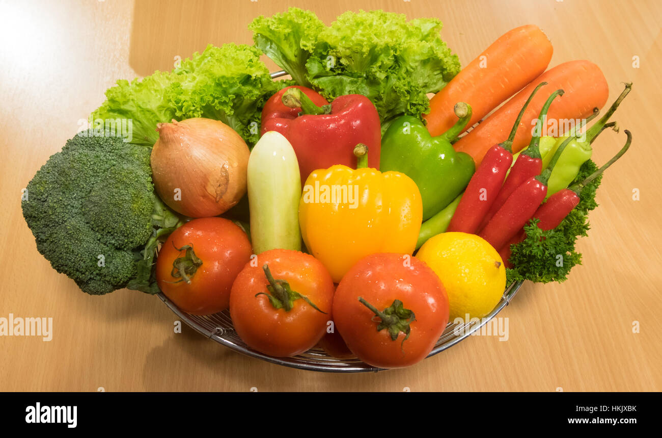 Vegetable in Basket on table Stock Photo - Alamy