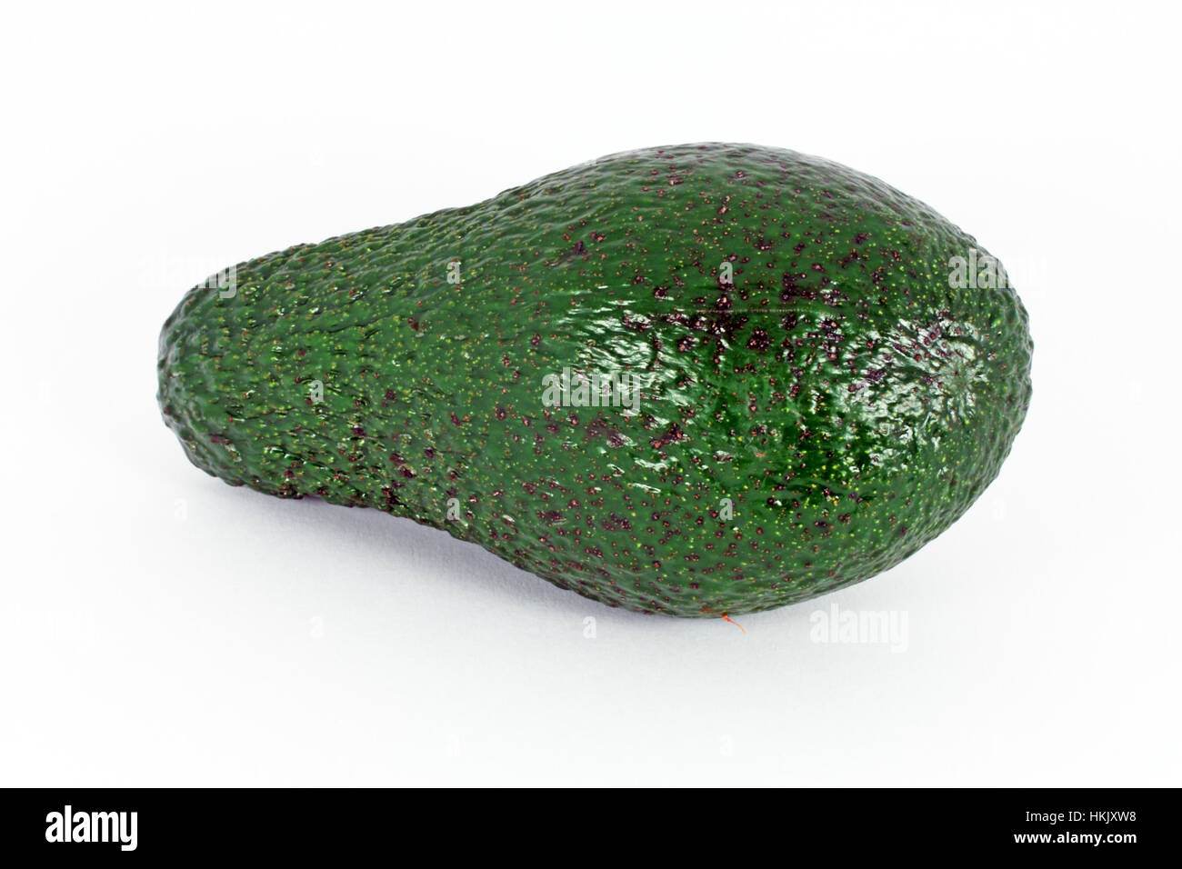 Single avocado fruit isolated on white background Stock Photo - Alamy