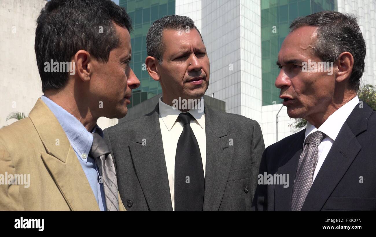 Business Men Explaining And Talking Stock Photo - Alamy