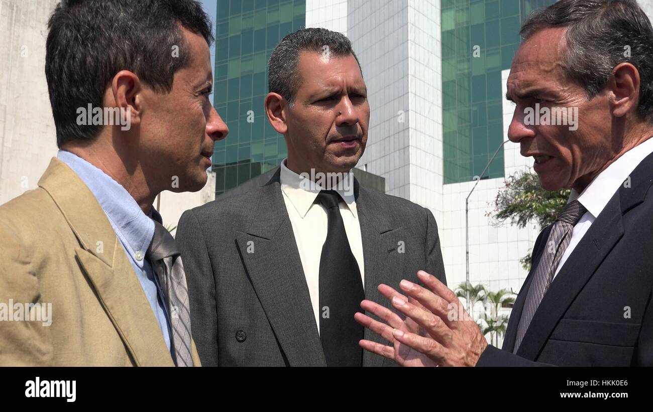 Boss Or Manager Talking To Employees Stock Photo - Alamy