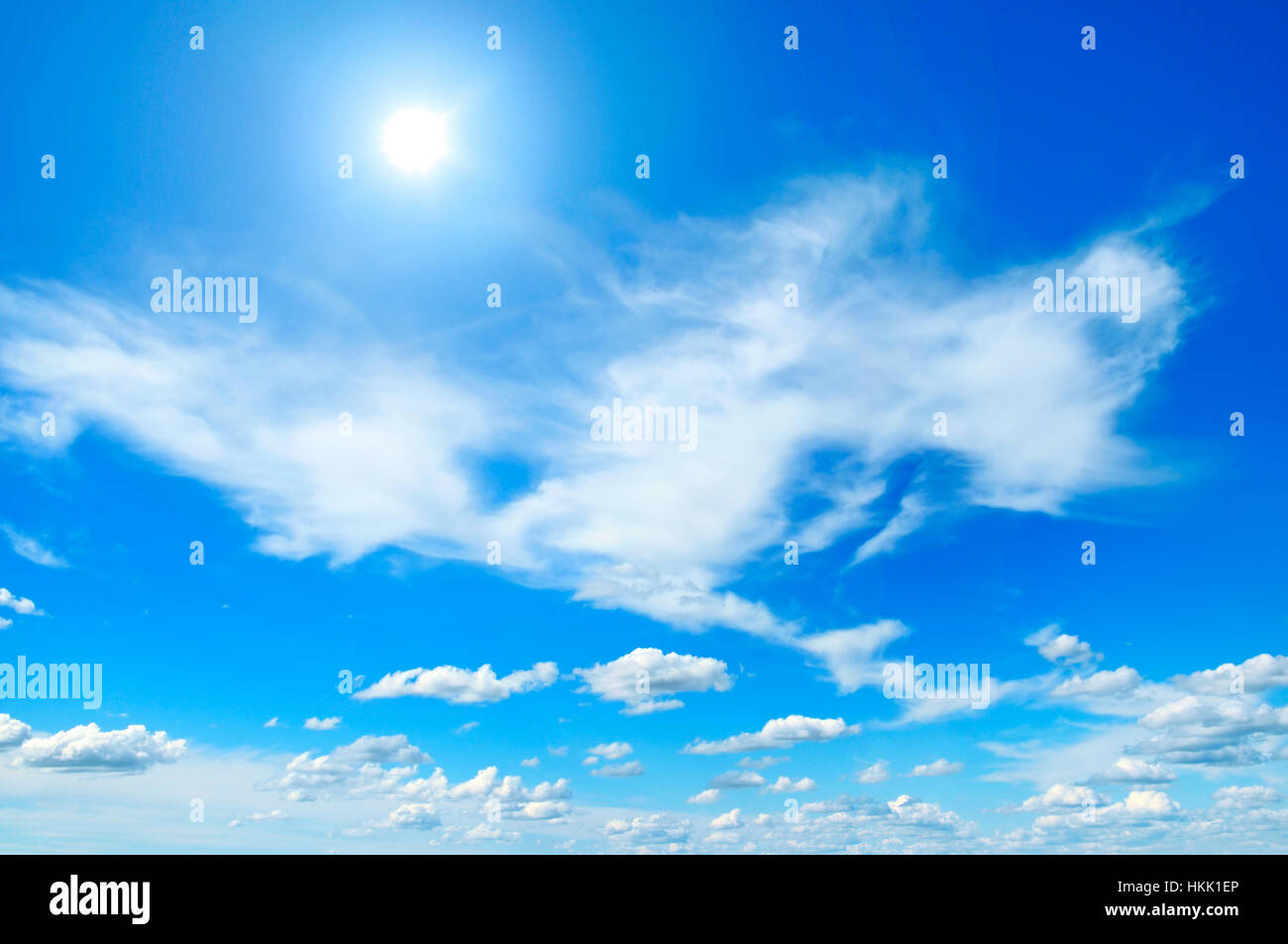 sun on beautiful blue sky Stock Photo - Alamy