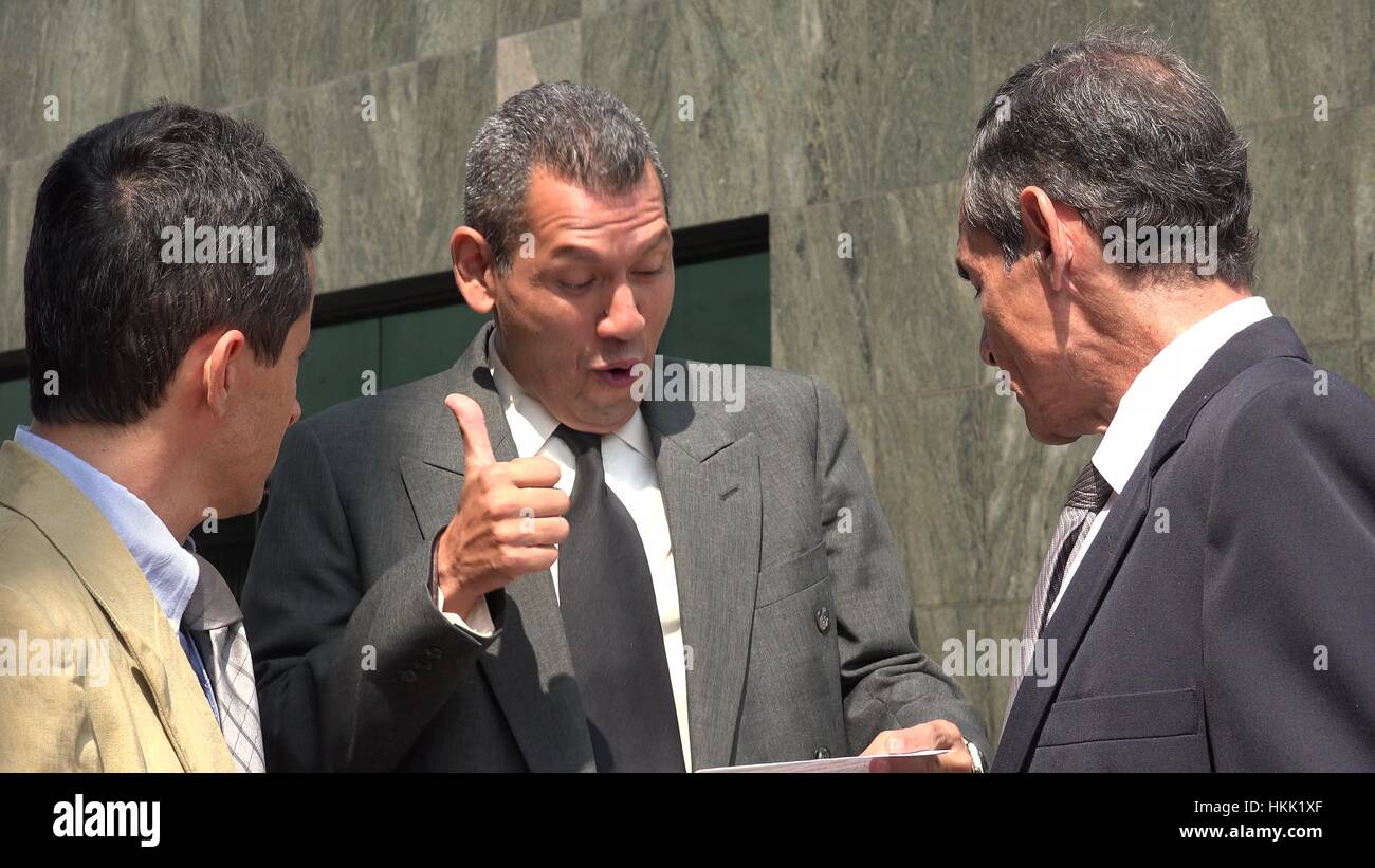 Business Men Exchanging Important Documents Stock Photo - Alamy