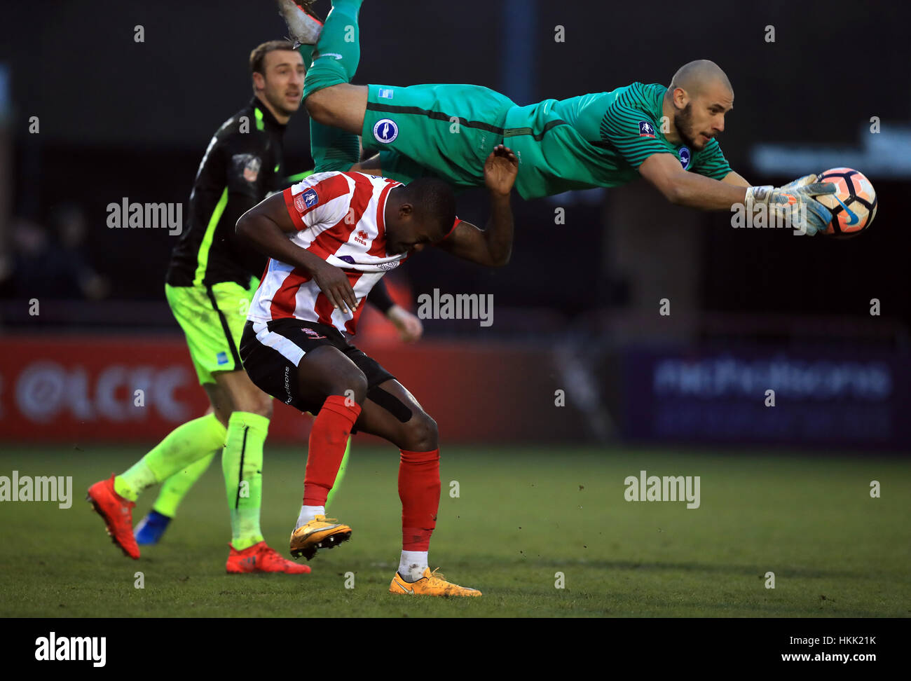 Lincoln's Theo Robinson and Brighton & Hove Albion goalkeeper Niki ...