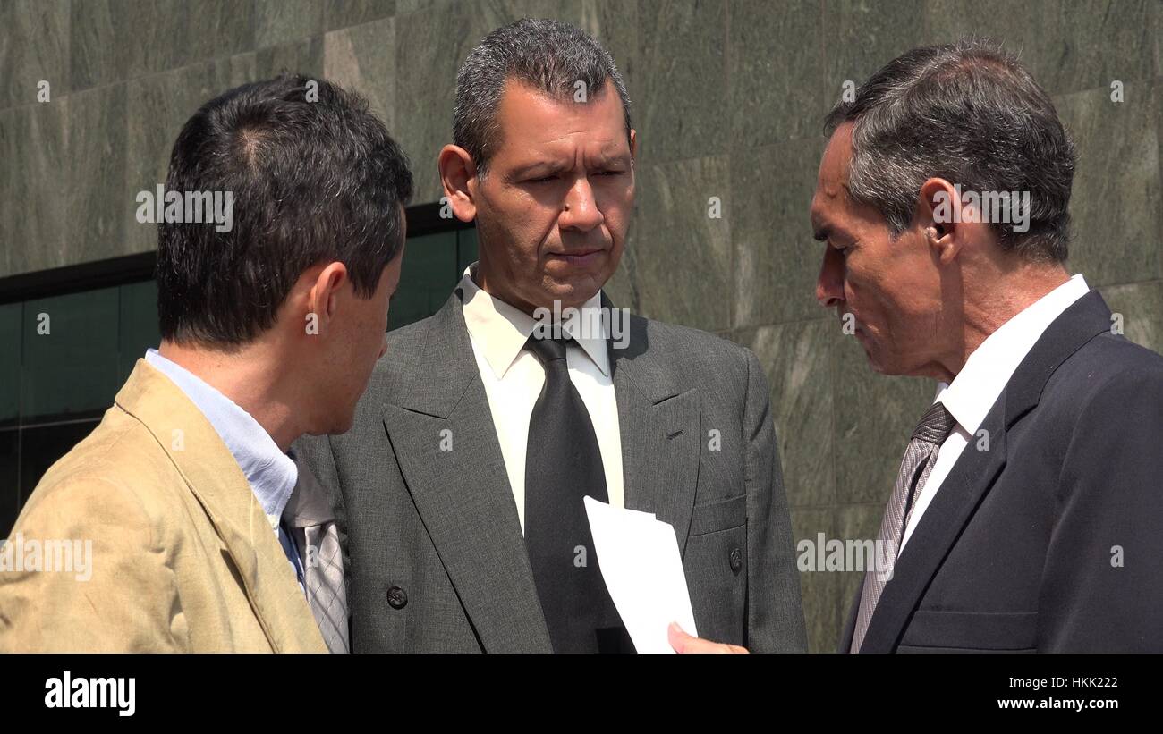 Business Man Handing Papers Stock Photo - Alamy