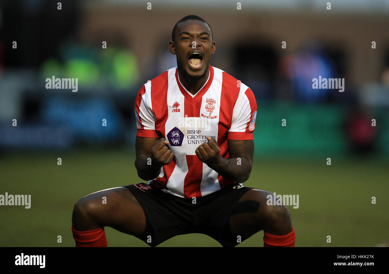 Lincoln City's Theo Robinson celebrates after Brighton's Fikayo Tomori ...