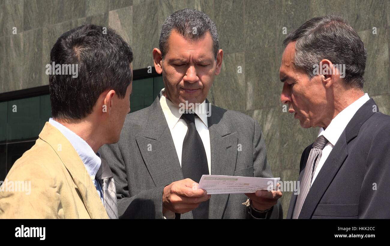 Business Man Looking At Documents Stock Photo - Alamy