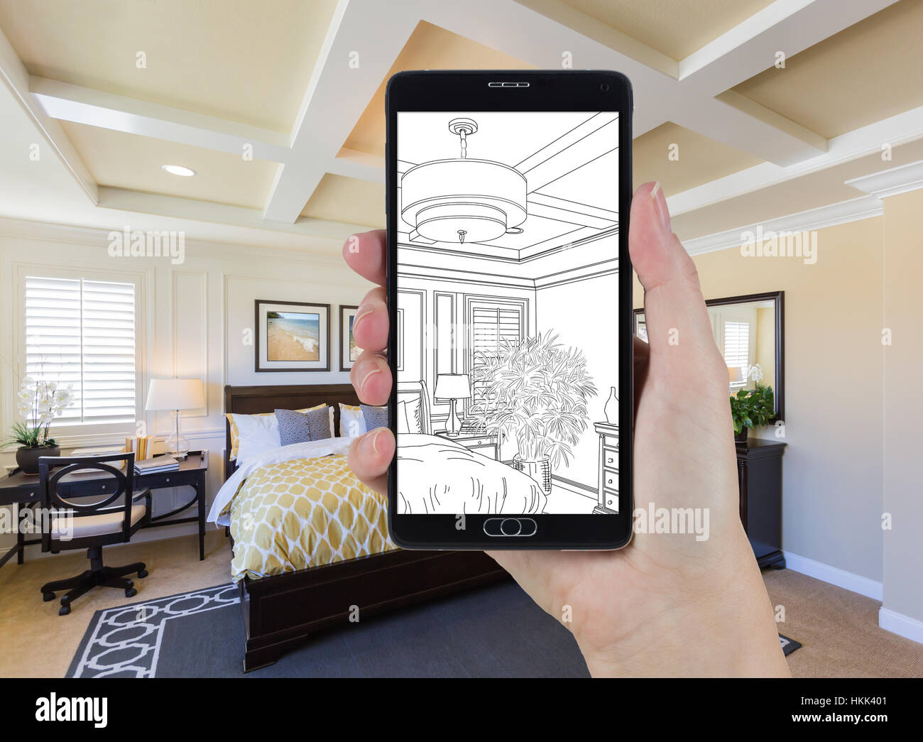 Hand Holding Smart Phone Displaying Drawing of Custom Bedroom Photo ...
