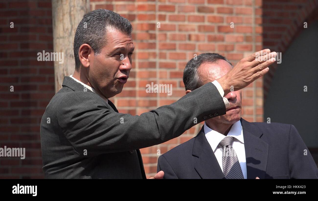 Business Man Giving Directions Stock Photo - Alamy