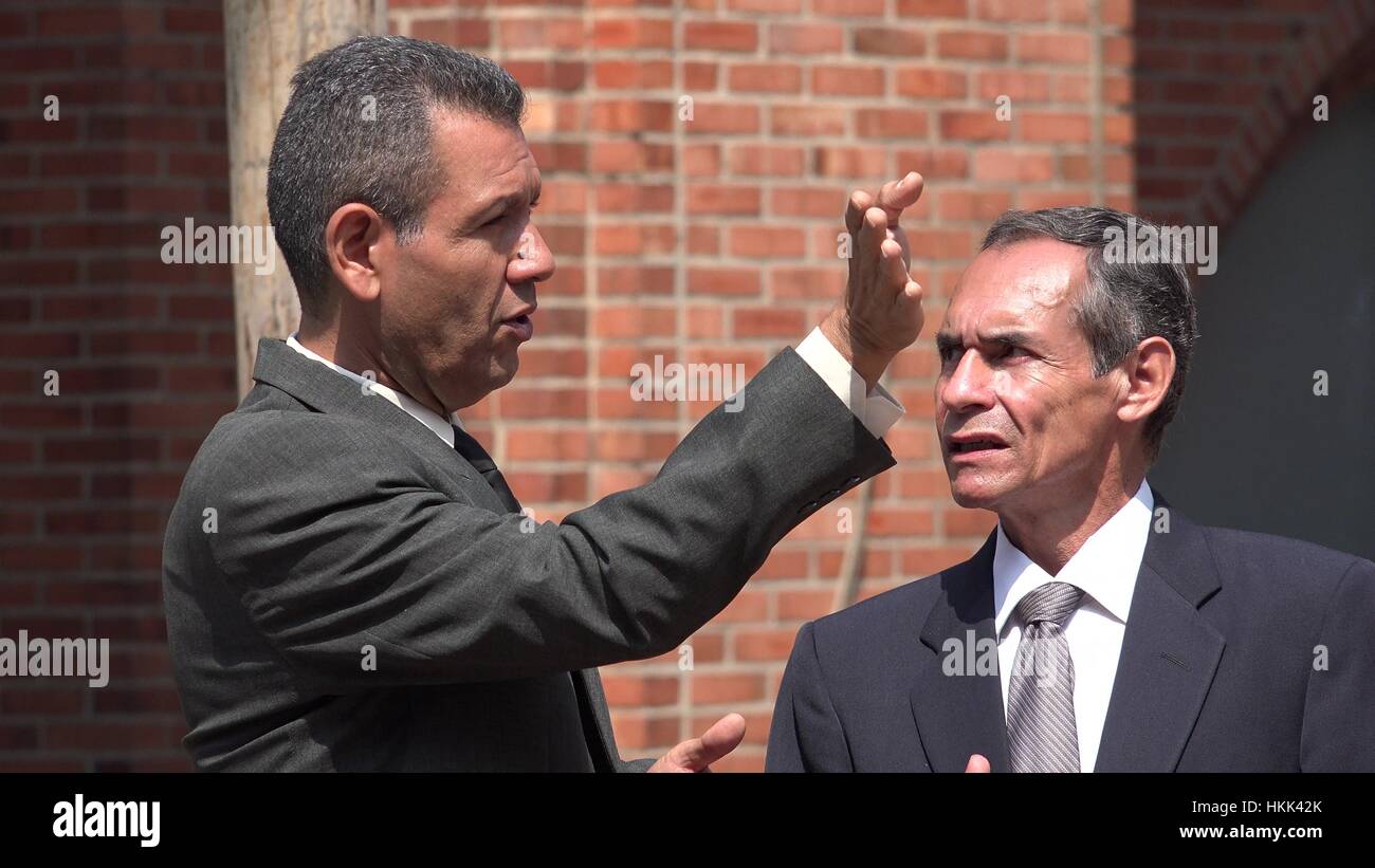 Businessman Giving Directions Stock Photo - Alamy