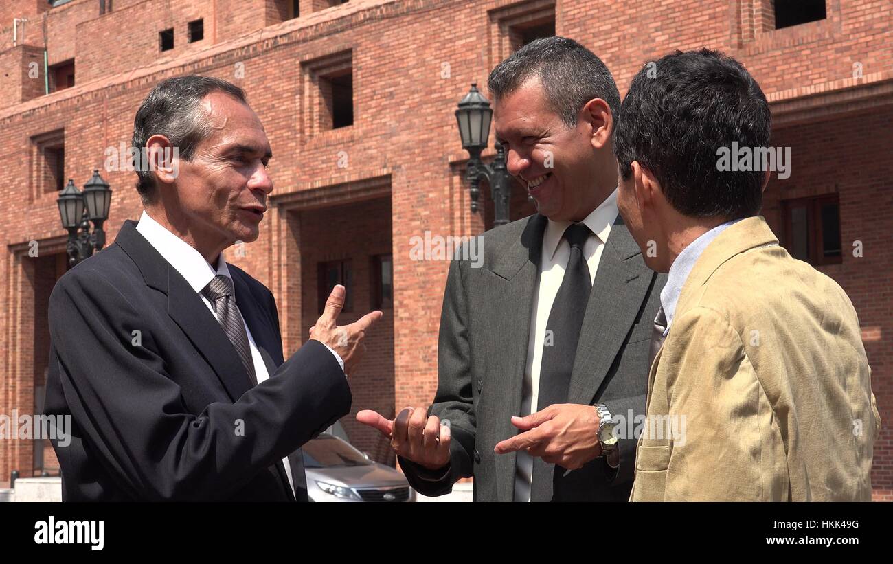 Business Men Socializing Stock Photo - Alamy