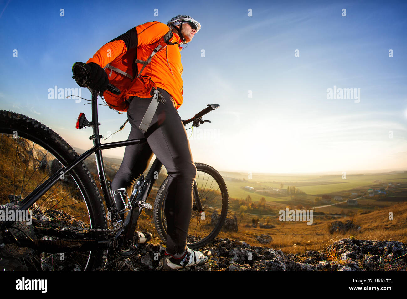 cyclist with a backpack Stock Photo - Alamy