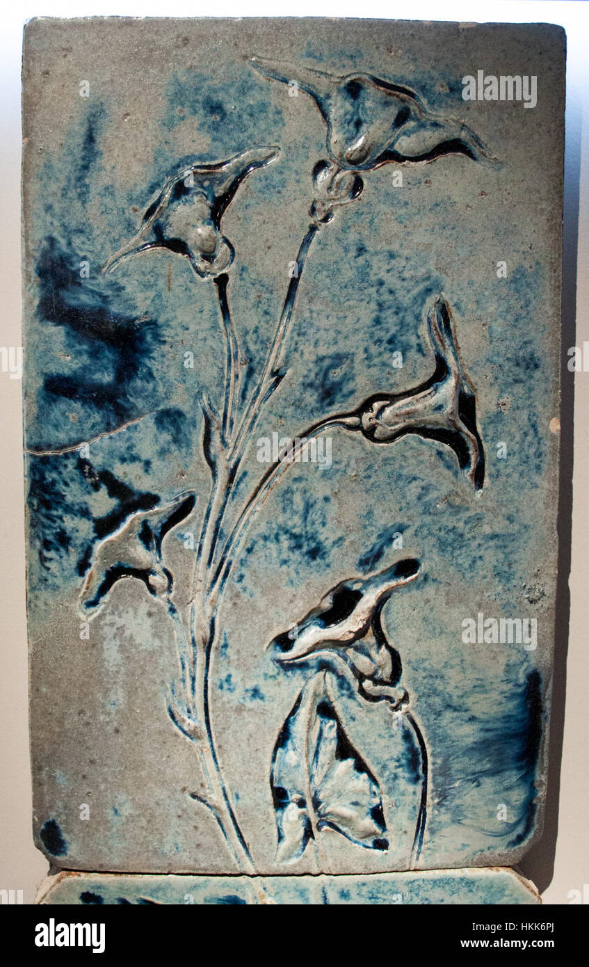 This artwork by Bigot features a blue-glazed revetment, showcasing ...