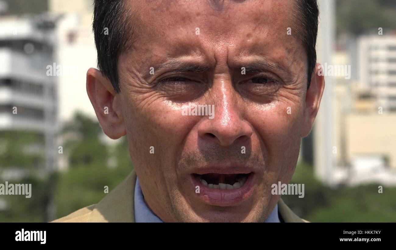 Hispanic Man With Anxiety Stock Photo - Alamy