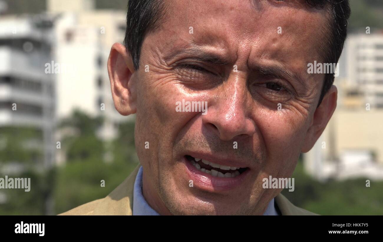 Stressed Hispanic Man Stock Photo - Alamy