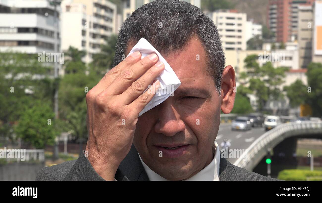 Exhausted And Perspiring Business Man Stock Photo - Alamy