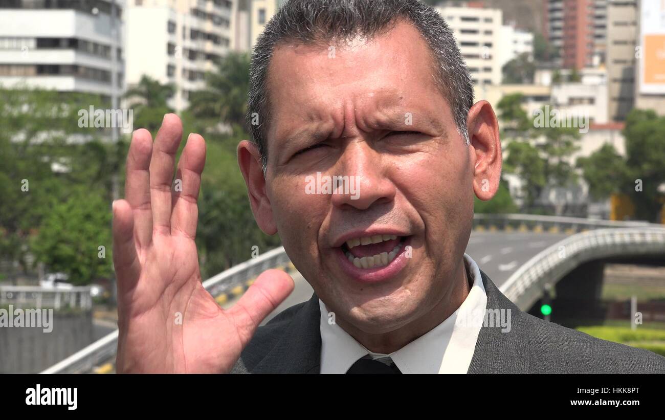 Upset Hispanic Business Man Complaining Stock Photo - Alamy Upset Hispanic Business Man Complaining Stock Photo - Alamy